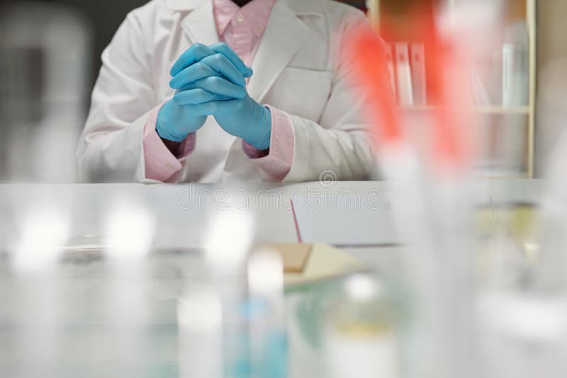 Laboratory Worker Sitting at Desk Stock Image - Image of technician ...