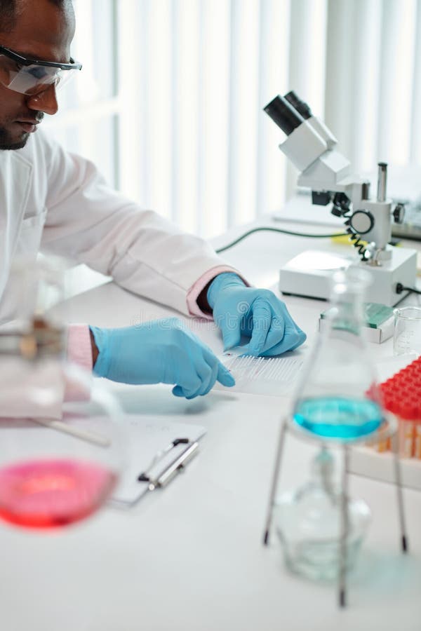 Laboratory Worker Checking Blood Stock Photo - Image of biochemistry ...
