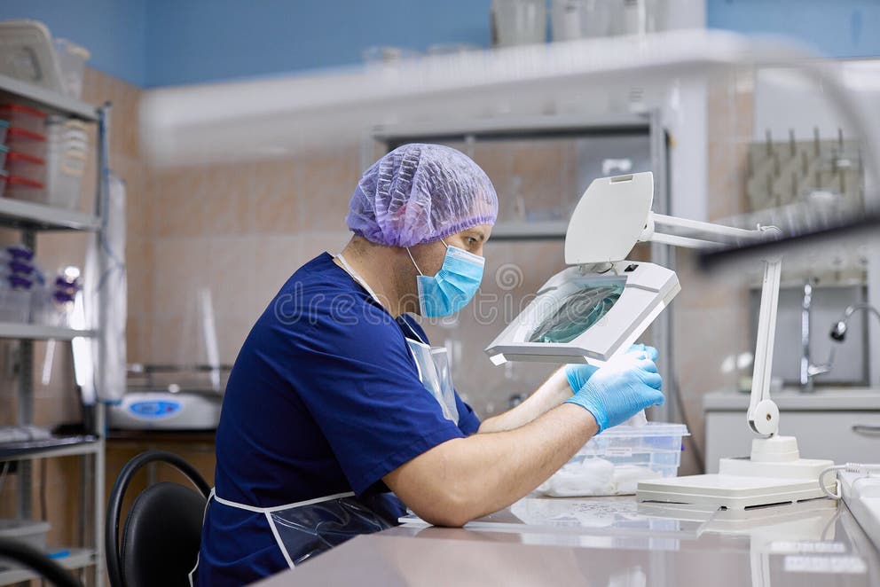 A Laboratory Worker Checks the Condition of the Samples before Testing ...