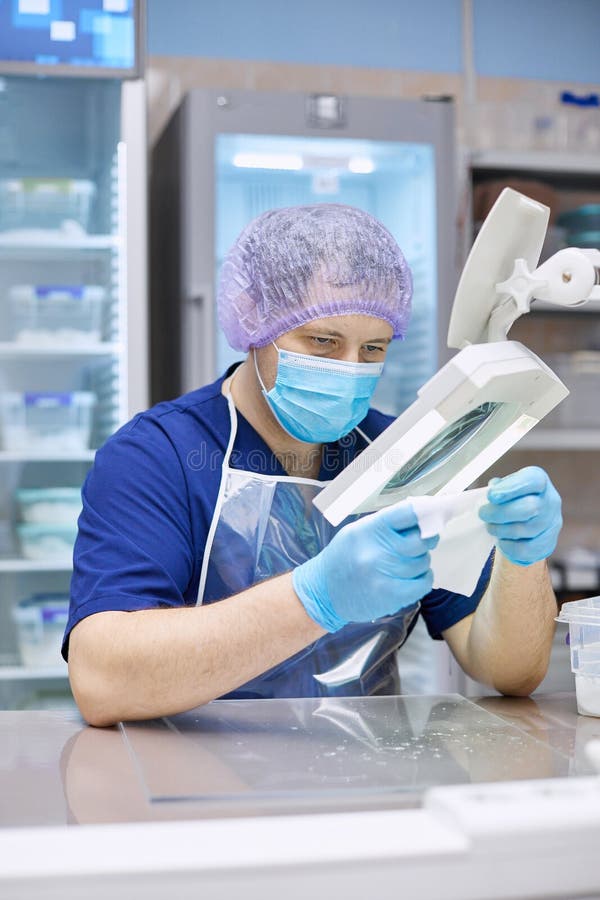 A Laboratory Worker Checks the Condition of the Samples before Testing ...
