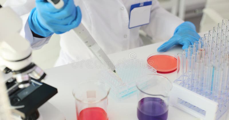 Laboratory Worker Draws Sample into Device for Making Smear Stock Video ... Laboratory Worker Draws Sample into Device for Making Smear Stock Video ...