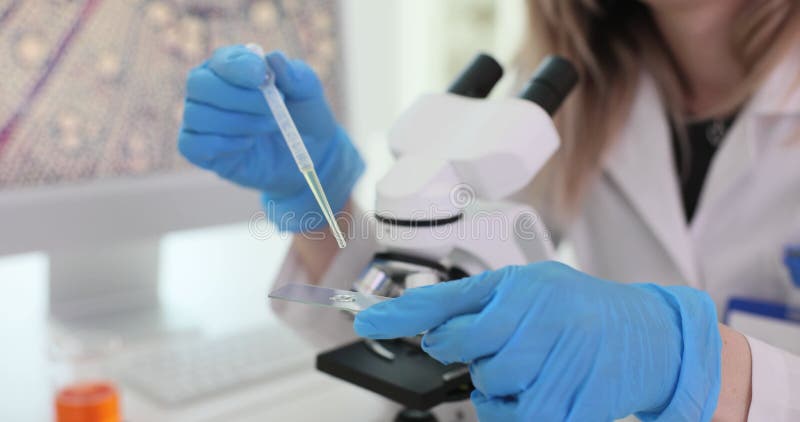 Laboratory Worker Drips Specimen Onto Microscope Slide Stock Video ...