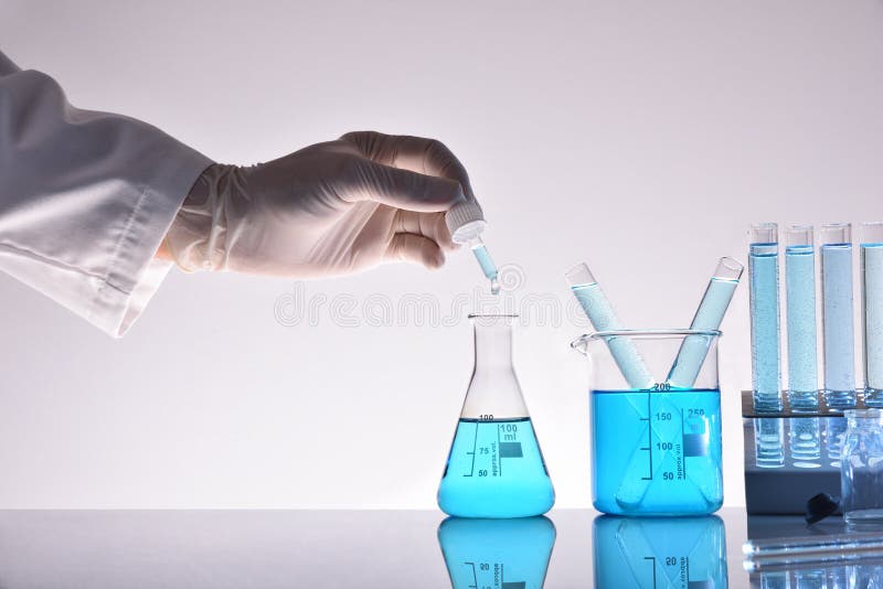 Hand of Laboratory Worker and Chemical Glassware Stock Image - Image of ...