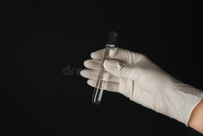 Laboratory Worker Holding Test Tube with Water on Black Background ...