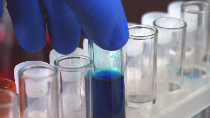 Laboratory Worker Matches Color with Test Indicator Paper Stock Video ...