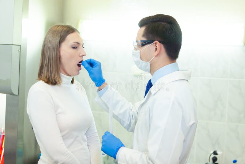 Laboratory Worker Performing DNA Paternity Test in a Medical Laboratory ...