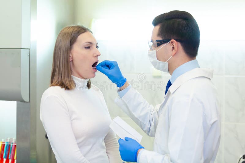 Laboratory Worker Performing DNA Paternity Test in a Medical Laboratory ...