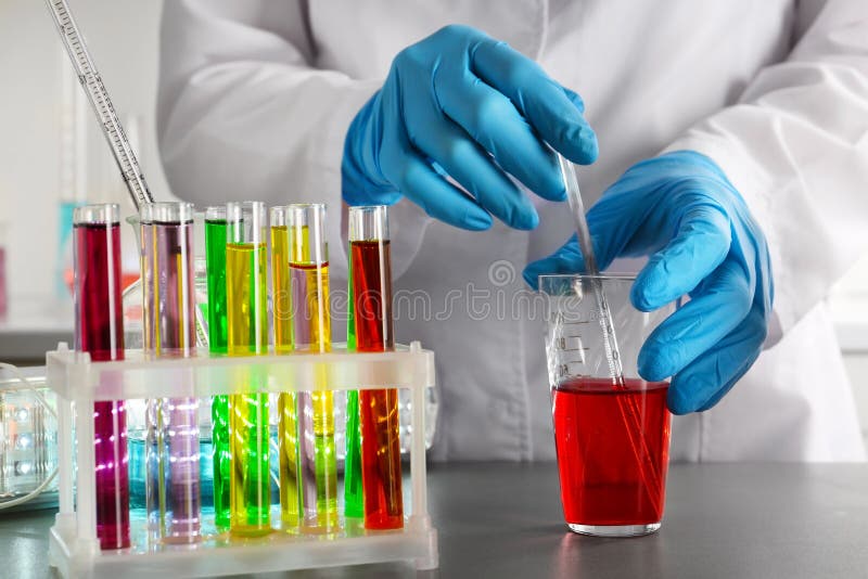 Laboratory Worker Taking Sample from Beaker, Closeup Stock Image ...