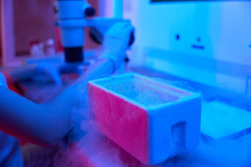 Laboratory Worker at Workplace Uses a Powerful Microscope Stock Image ...