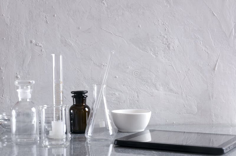 Many Different Medical Glassware for Laboratory Experimets, Tablet on ...