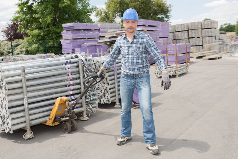 Laborer using pull cart stock photo. Image of steel, production - 83785866