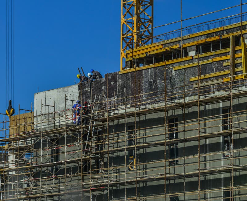 Laborers Working on Modern Construction Site Editorial Stock Photo ...