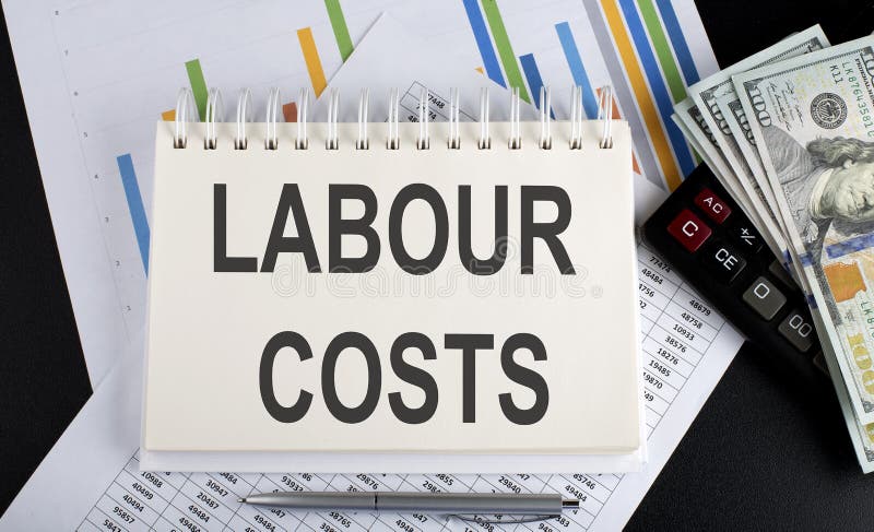 LABOUR COSTS Text Written on the Notebook with Chart,calculator and ...