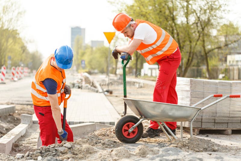 Labourers Digging on Road Construction Stock Image - Image of ...