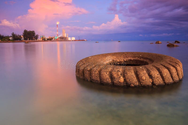 Malaysia. Sunset at Petronas Methanol Labuan Stock Image - Image of ...