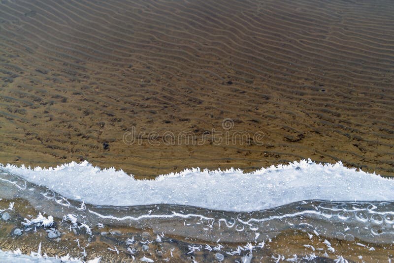 Lace Patterns of the Frozen Water Edge on the Pond. Stock Image - Image ...