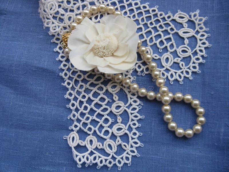 Lace and pearl stock image. Image of fabric, hand, flower - 9184239