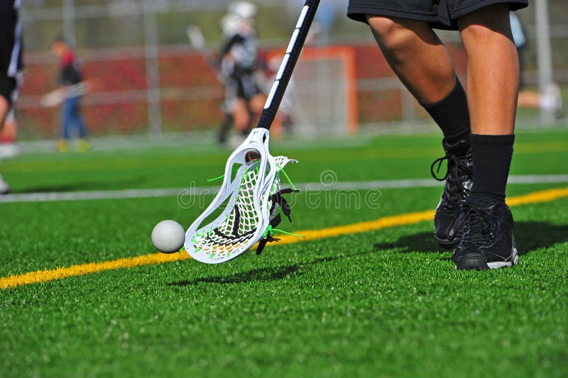 Lacrosse ball catching stock image. Image of motion, action - 19341673