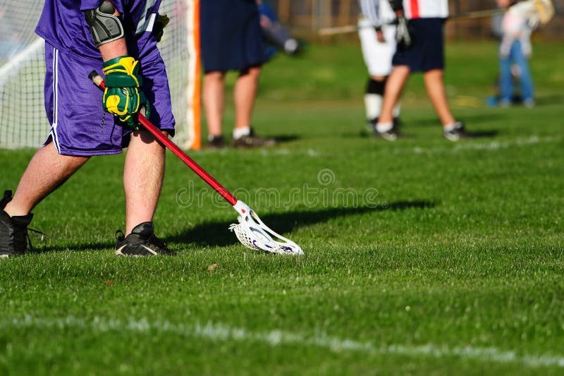 Lacrosse Que Saca La Bola Con Pala Foto de archivo - Imagen de joven ...