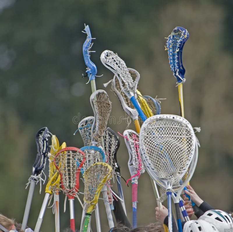 Lacrosse Sticks Reaching To the Sky Stock Image - Image of equipment ...