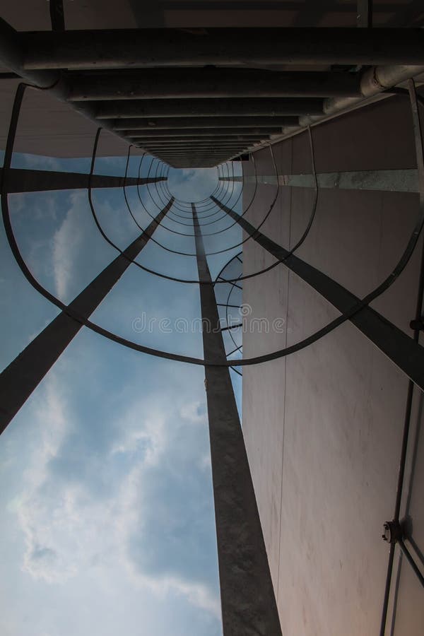 Ladder from the bottom up. stock photo. Image of high - 60726510