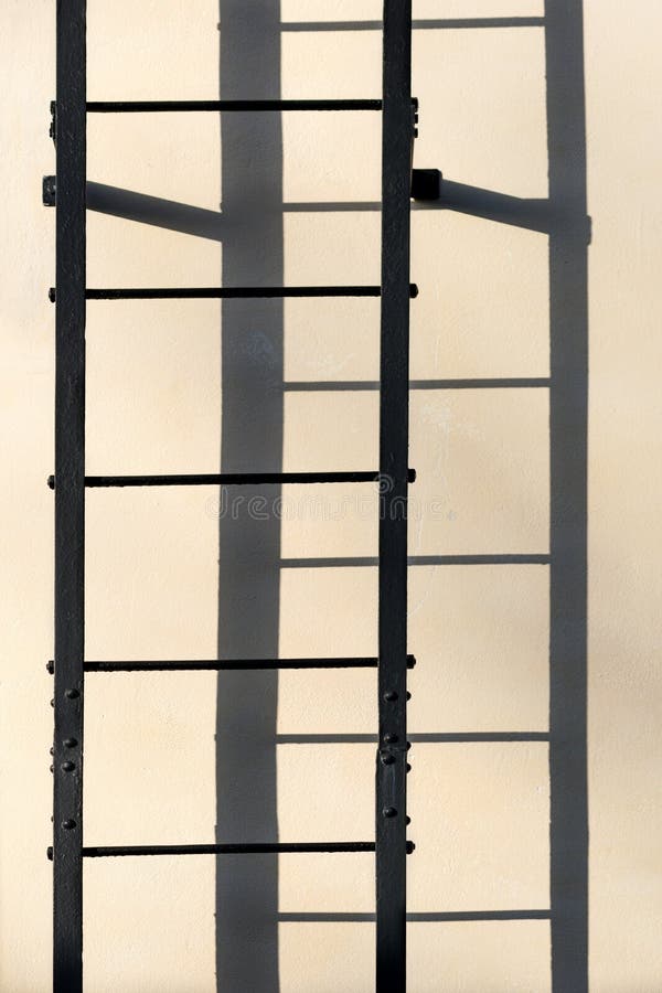 Ladder Casting Shadow on Wall Stock Image - Image of wall, metal: 39481577
