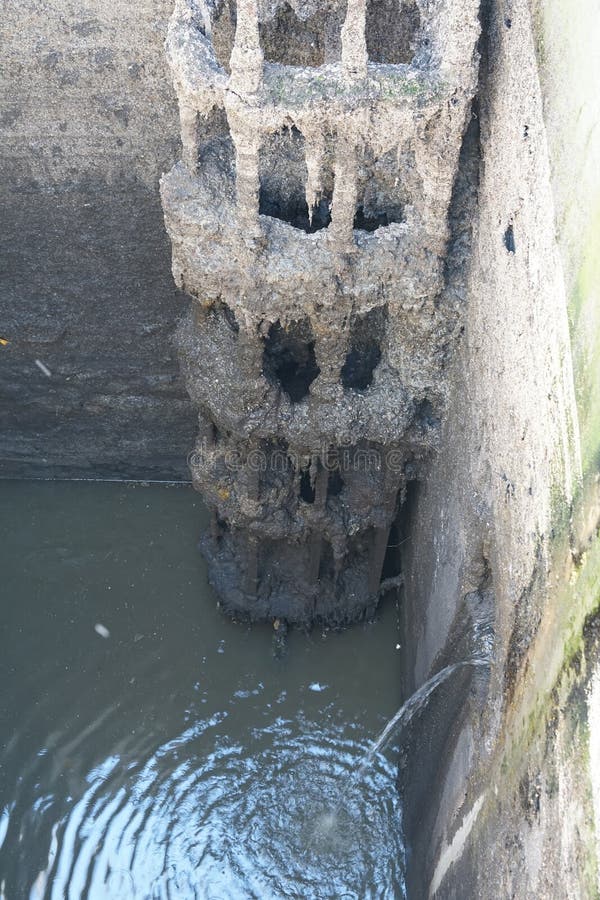 A Ladder in a Deep Shaft, Covered with Grease Stock Photo - Image of ...