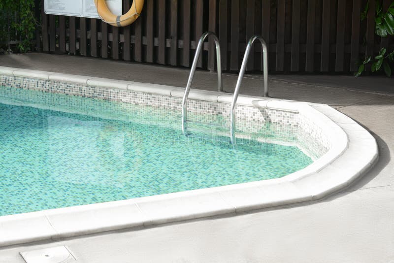 Ladder with Grab Bars in Outdoor Swimming Pool Stock Image - Image of ...