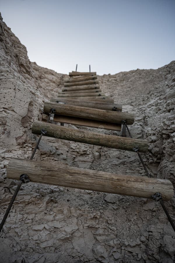 Ladder on a steep cliff stock photo. Image of hill, danger - 68719348