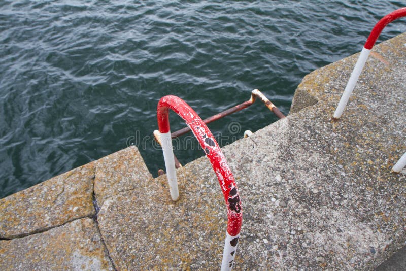 Ladder leading to water stock photo. Image of lake, concrete - 96547688