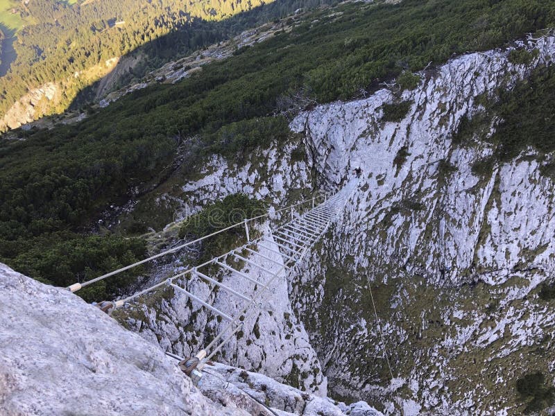 A Ladder on the Rock for Climbing Stock Photo - Image of peak ...