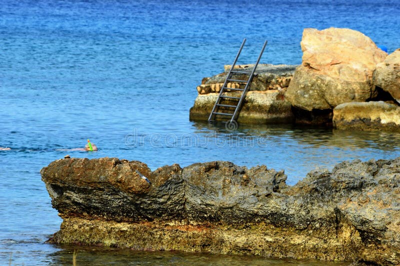Ladder on the Rock for Descending into the Sea Stock Image - Image of ...