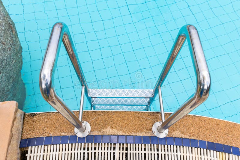 Ladder Stainless Stairs into the Swimming Pool. Stairs Swimming Pool ...