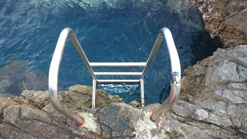 Ladder Leading Into The Sea Stock Image - Image of blue, outside: 15249121