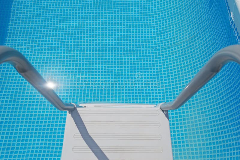 Ladder in the water stock photo. Image of transparent - 34084470