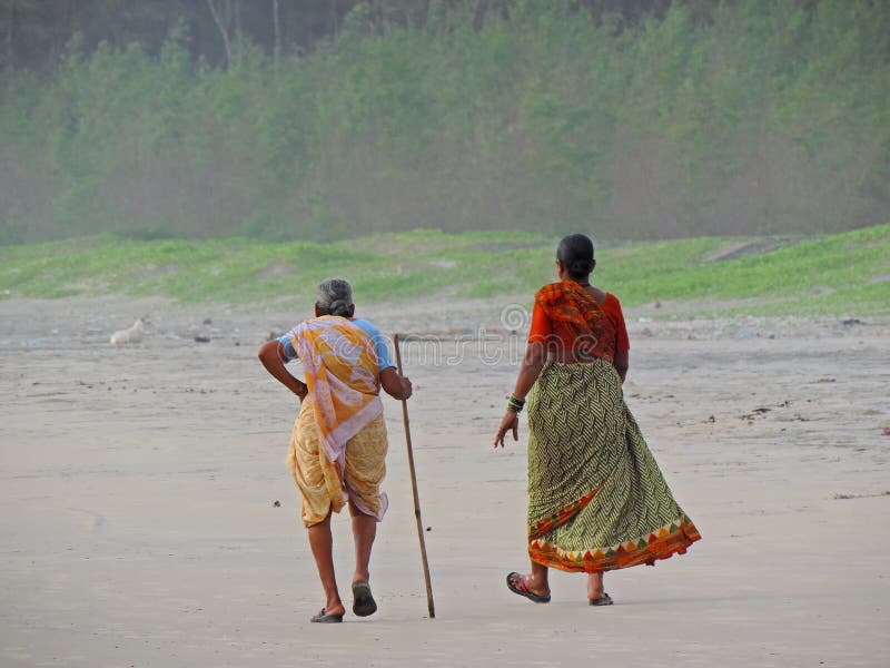 Ladies Taking a Stroll on the Beach Editorial Stock Image - Image of ...