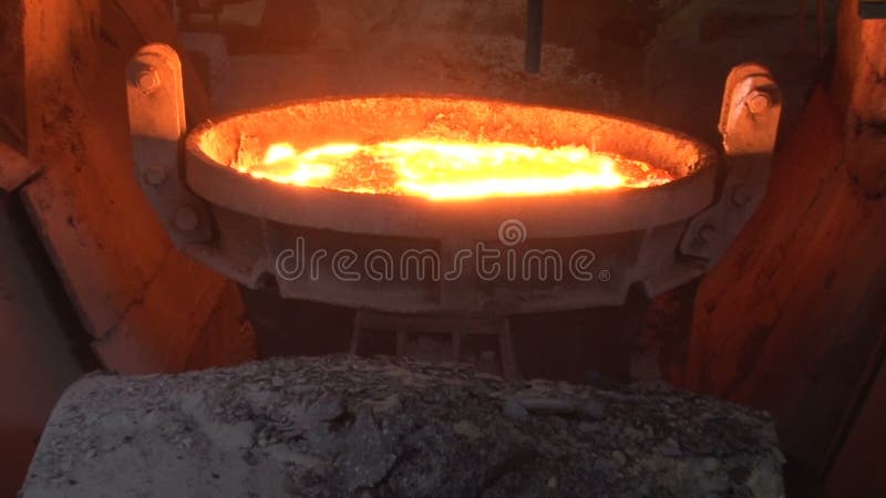 Molten Metal is Poured from a Ladle, Side View Stock Video - Video of ...