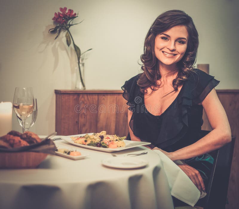 Lady alone in restaurant stock photo. Image of luxury - 47732832