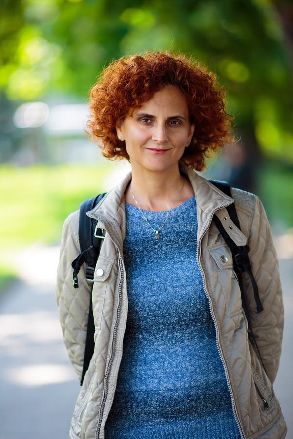Lady with Backpack in the Park Stock Photo - Image of outdoor, curly ...
