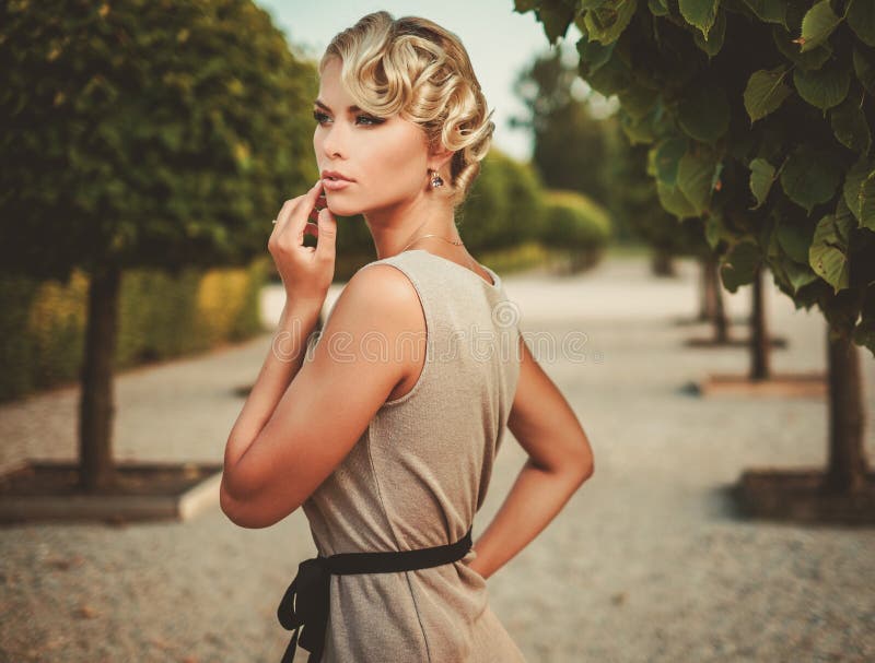 Lady in a beautiful alley stock image. Image of bowtie - 59012523