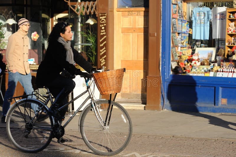 Lady on bike in Cambridge editorial photo. Image of city - 23498026