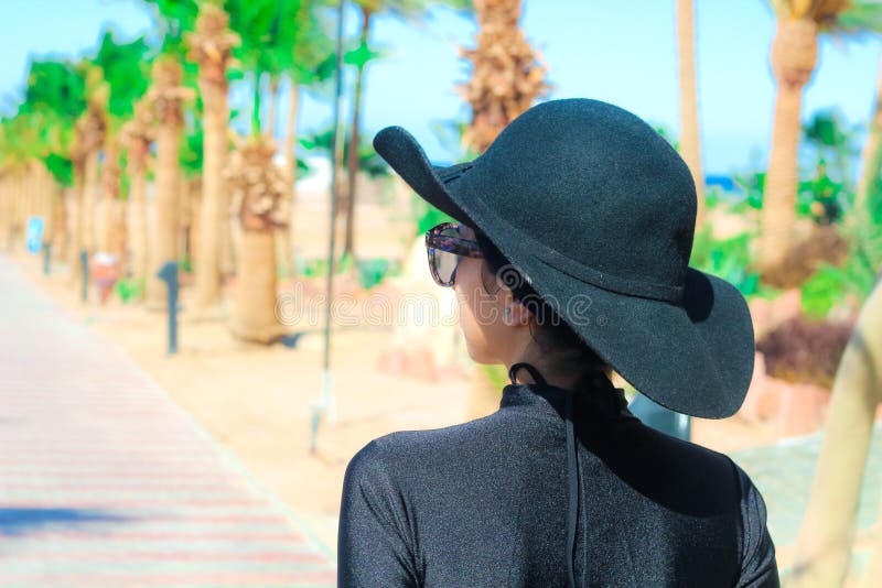 The Lady with the Black Hat Laughing and Having Fun Under the Sun Stock ...