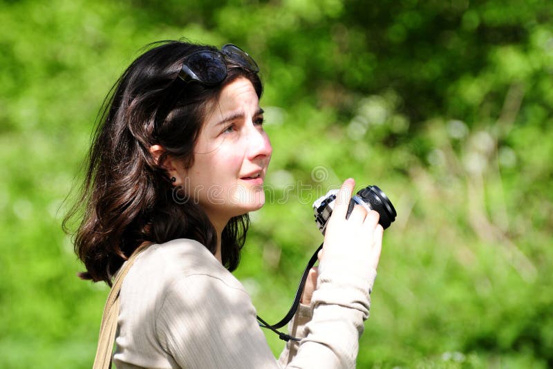 Lady with Camera stock photo. Image of foliage, long, bushes - 7472006