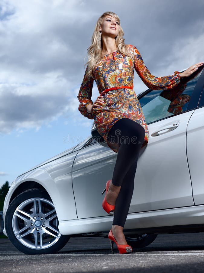 Lady and a car stock image. Image of black, serenity - 21266287