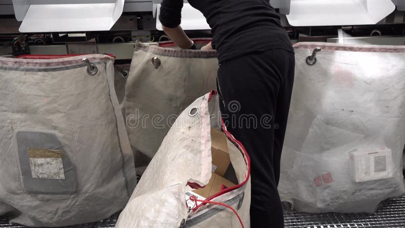 Lady Closing Bag from Automated Parcel Sorting System Stock Video ...