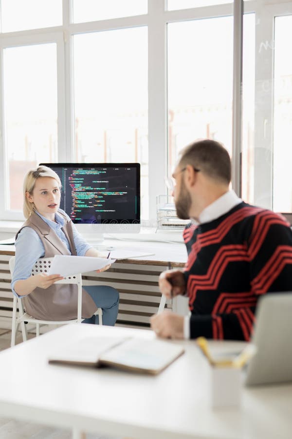 Lady Coder Giving Information about App To Colleague Stock Image ...