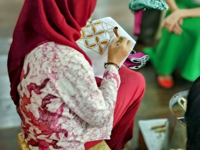 A lady drawing Batik Motif stock image. Image of pink - 367864929