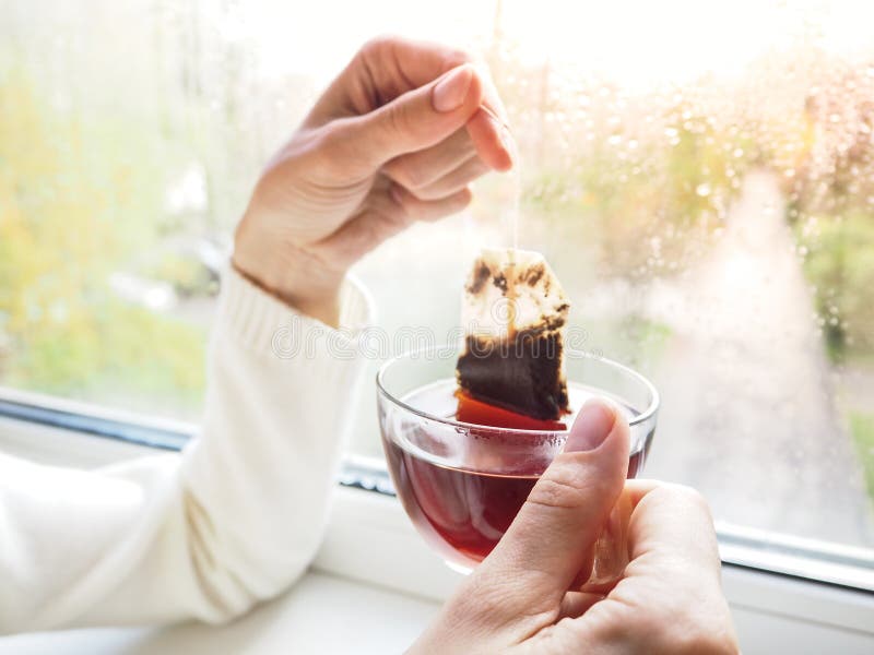 Lady Drinking Coffee by the Window. Stock Image - Image of resting ...