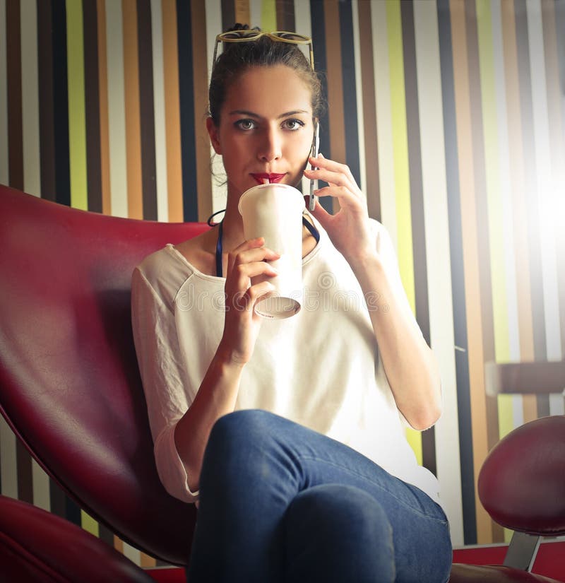 Lady drinking milkshake stock photo. Image of beautiful - 67494628