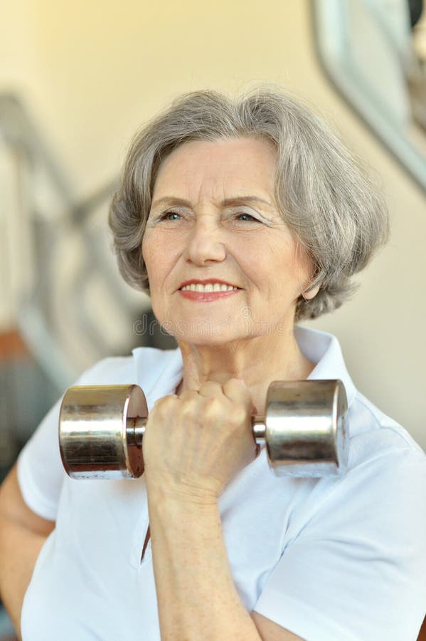 Lady with dumbbell stock image. Image of nature, lifting - 42947619
